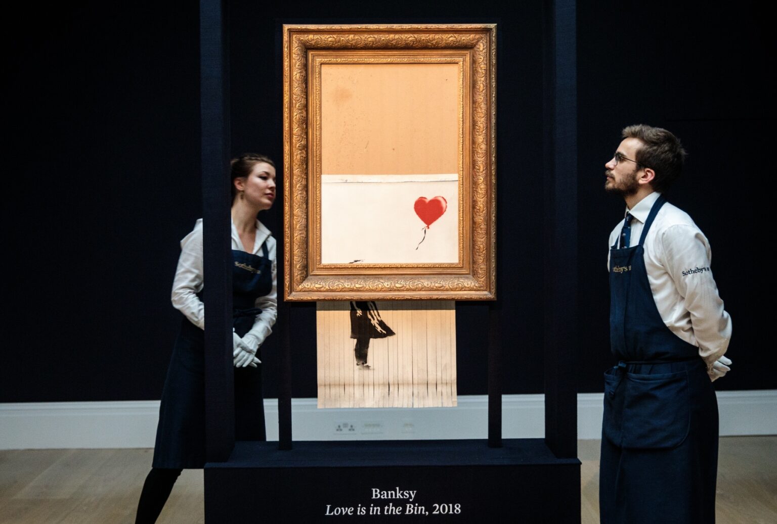 Banksy put up a $600,000 stop sign. Two men with bolt cutters took it ...