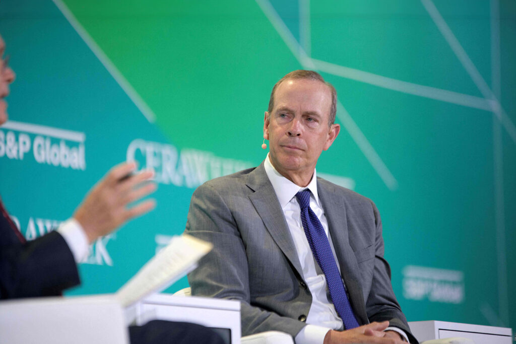 "You're a mass murderer": Climate protesters confront Chevron CEO at ...