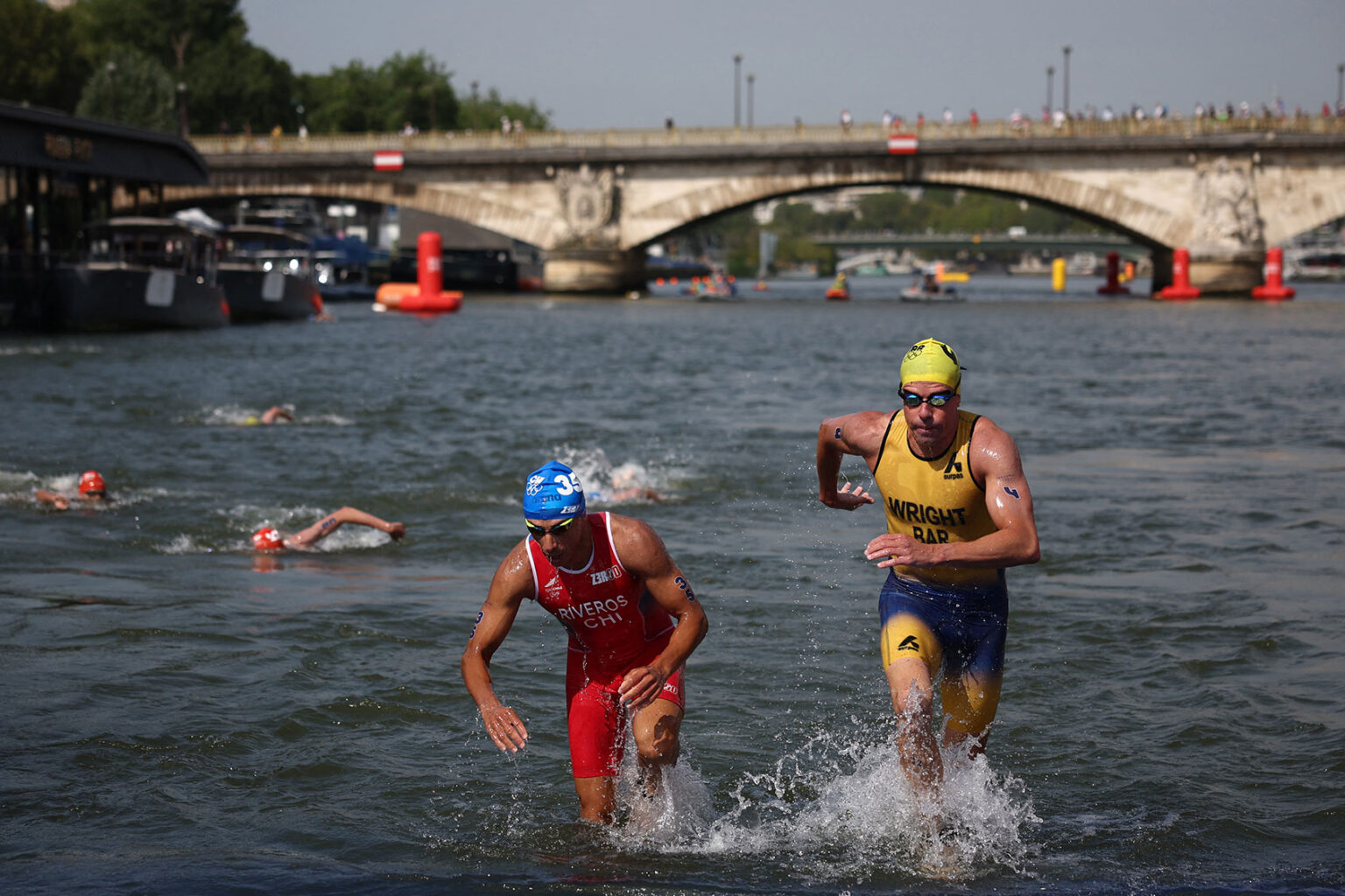 Olympic swimmers try to "flush out" Seine bacteria by drinking Coca ...