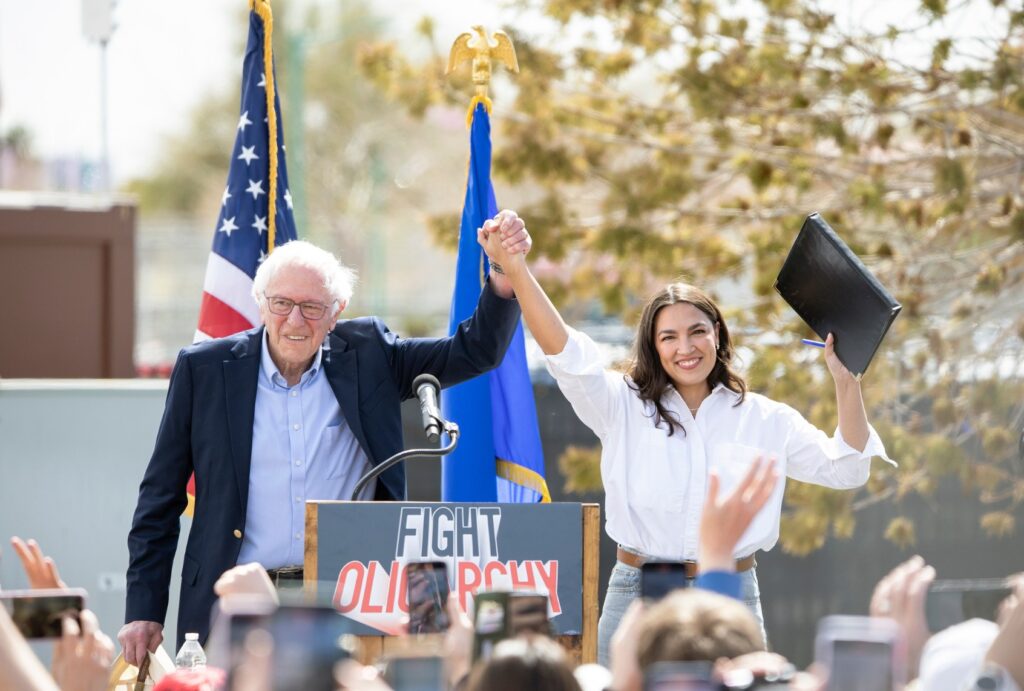 "Throw these bums out": AOC and Bernie Sanders take their campaign ...